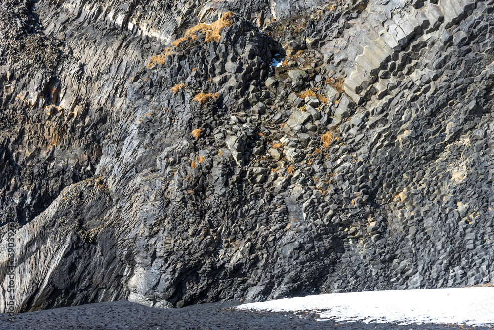 Black basalt columns of Reynisfjara, famous black-sand beach in the ...