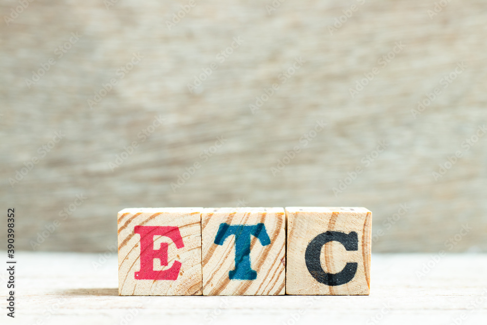 Alphabet letter in word etc (abbreviation of et cetera) on wood ...
