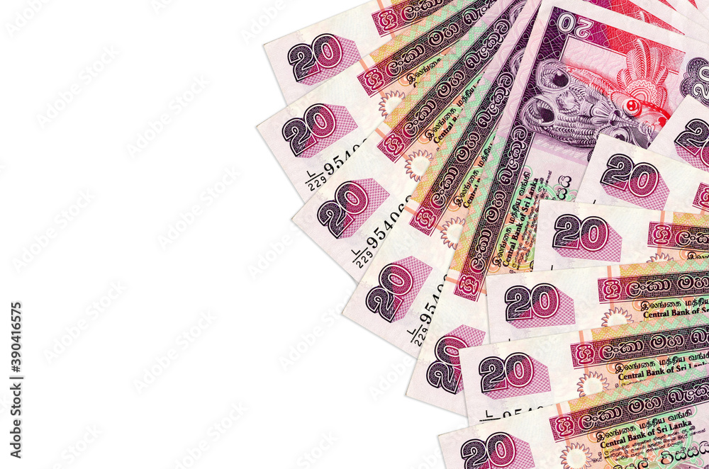 20 Sri Lankan rupees bills lies isolated on white background with copy ...