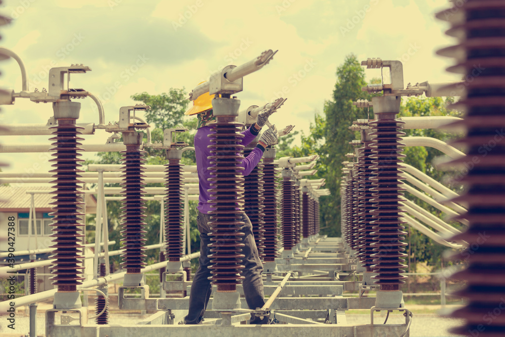 The engineering team is maintaining the 115 KV electrical blades in the ...