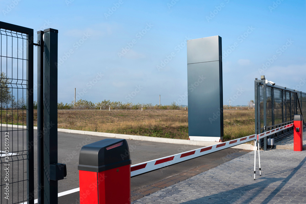 Closed automatic gate of the barrier. Automatic security system for ...