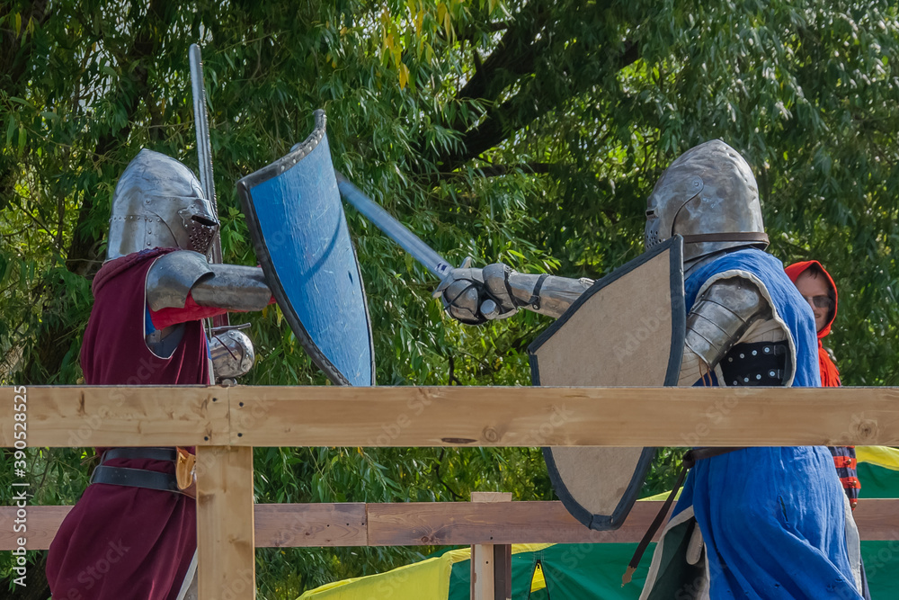 Tver / Russia - September 29 2020: Warriors in heavy armor fight with ...