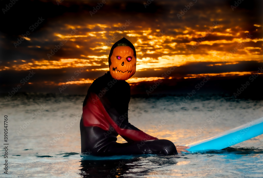 Halloween Costume Surfing Various scary costumes worn by a surfer while ...