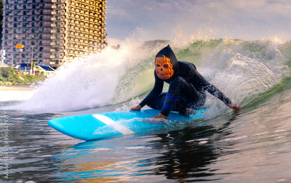 Halloween Costume Surfing Various scary costumes worn by a surfer while ...