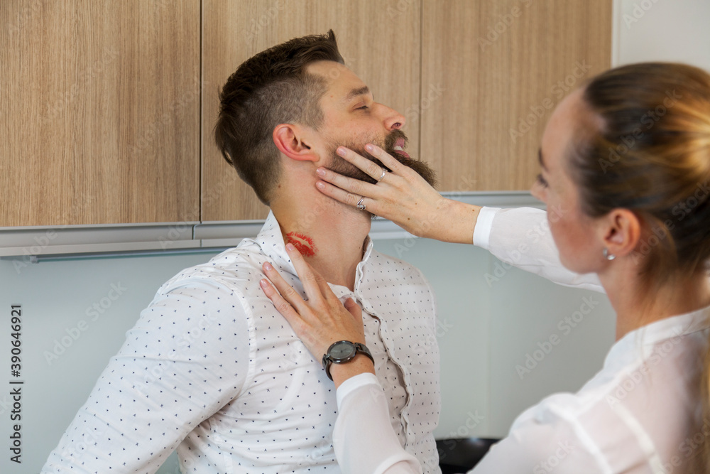 jealous woman discovers love bite at neck of her husband Stock Photo ...