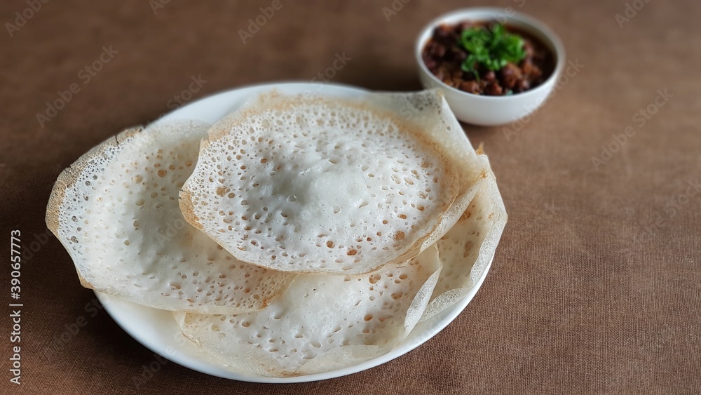 Hoppers with black chickpea gravy, A South Indian breakfast delicacy ...