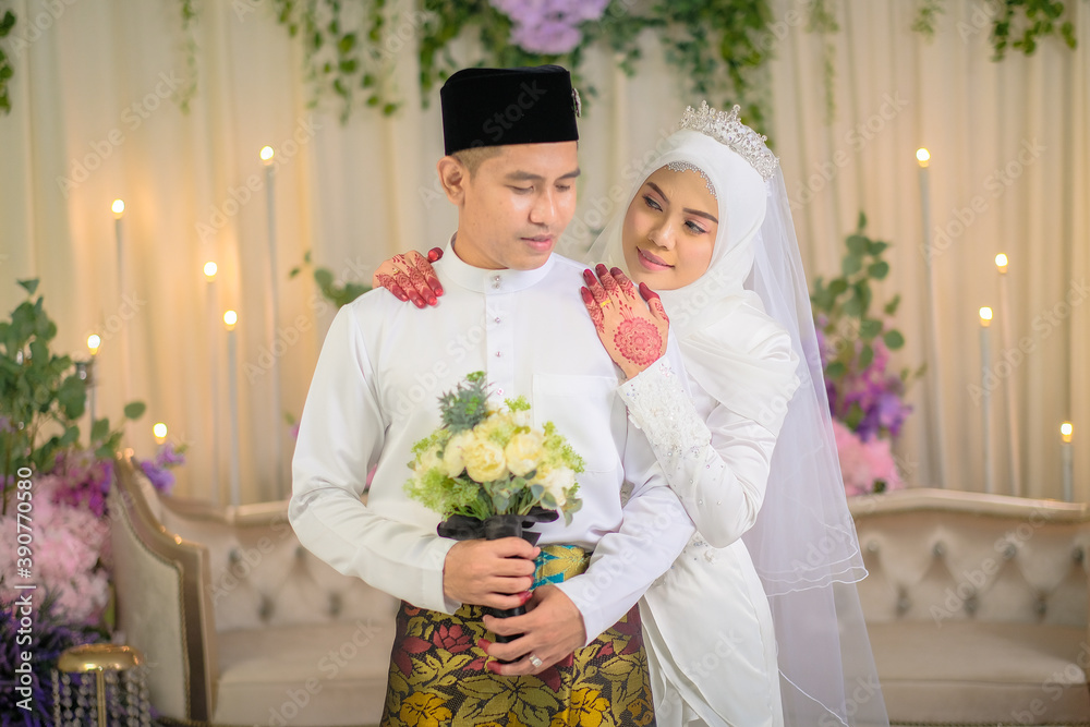 Indoor shooting for Malay wedding, the bride and groom wearing Malay ...