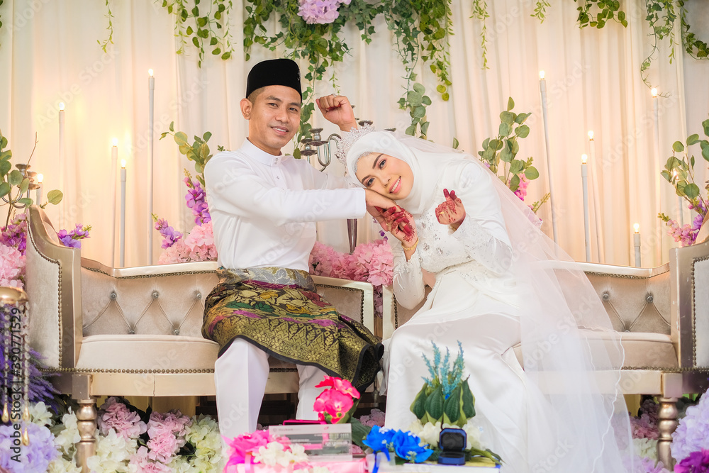 A muslim couple getting solemnization . Malay Traditional Wedding. In a ...
