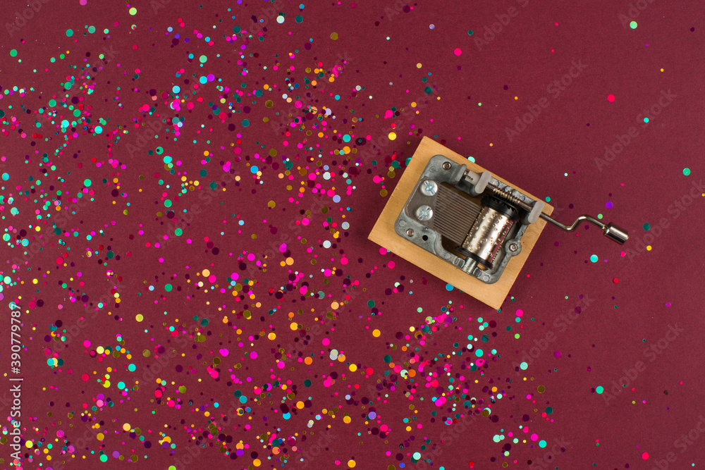 Manual music box mechanism on dark read with glitter background Stock ...