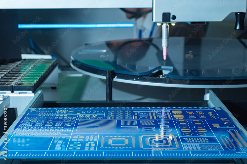 PCB production using laser equipment. Printed circuit board on a laser ...