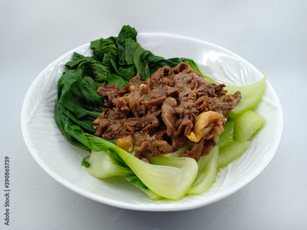 Sauté pokcoy vegetables with thin slices of beef cooked with garlic ...
