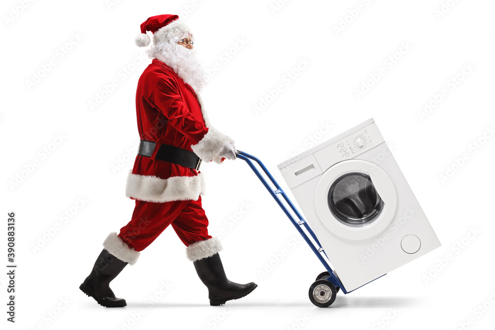 Santa claus pushing a washing machine on a hand truck Stock Photo ...