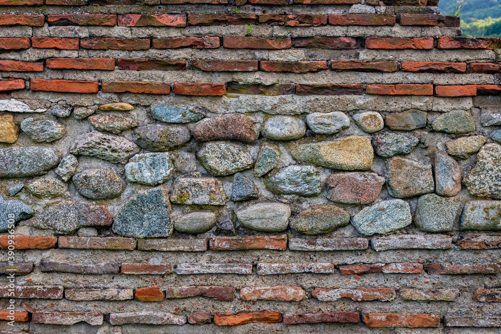 Details and texture of ancient Roman wall made of red bricks and ...