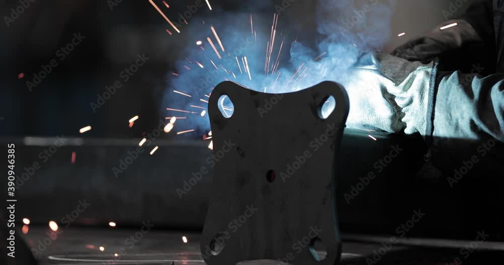 Steelworker Welding Base Plate To Metal Tubular Pipe - slow motion ...