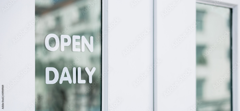 Wording "open daily" sticker put on clear glass door symbol use for ...