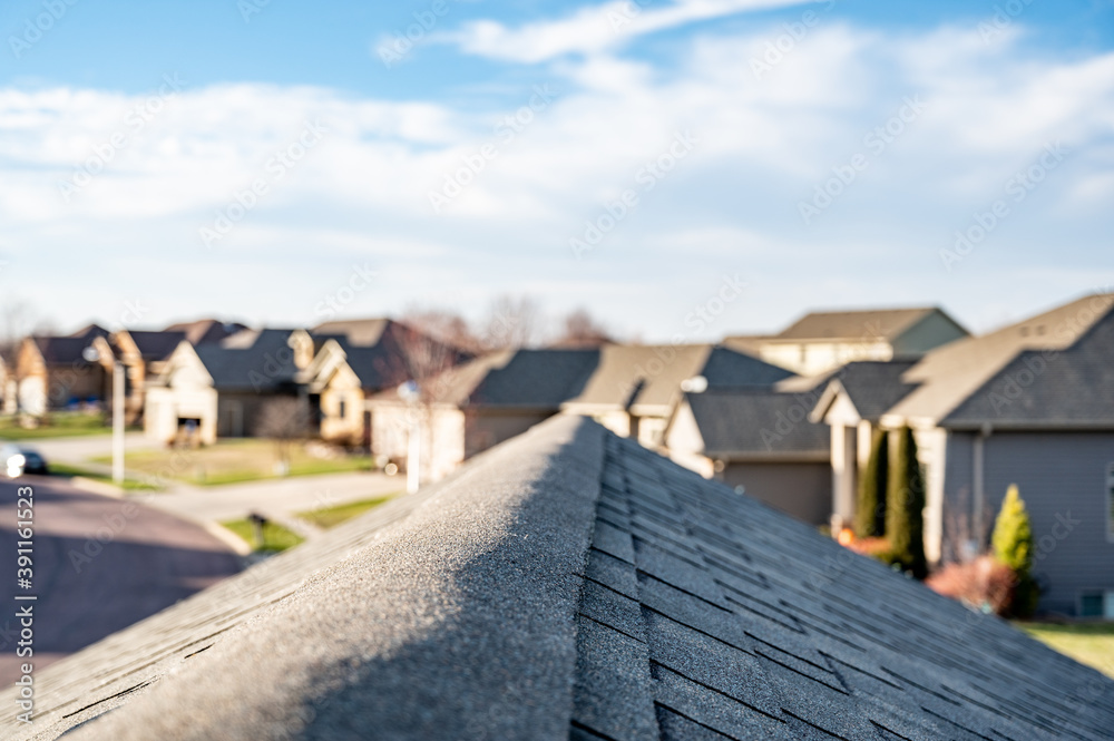 View down the top of an Asphalt shingle roof with ridge cap Stock Photo ...