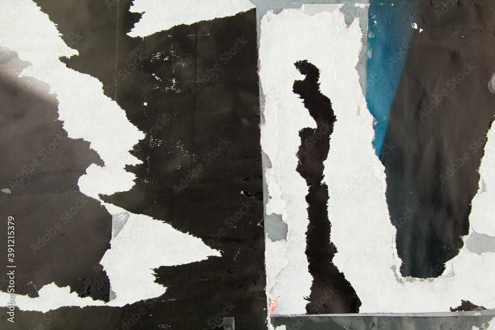 Black torn and crumpled magazine paper with dirty glue marks and stains ...