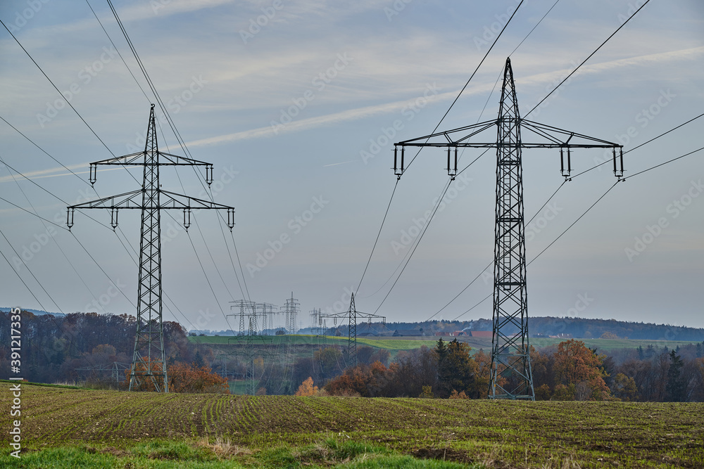 Large transmission towers in the countryside. Different types of ...