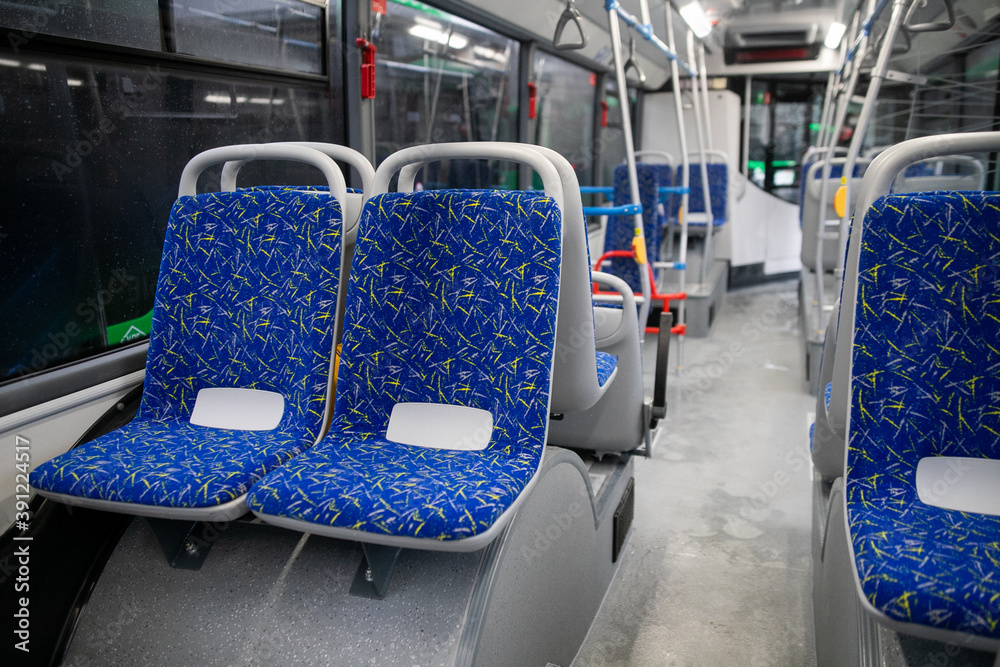 Empty bus interior. Blue seats without passengers. Public transport ...