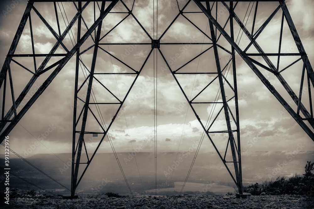 At the base of a transmission tower on a stormy fall day foto de Stock ...