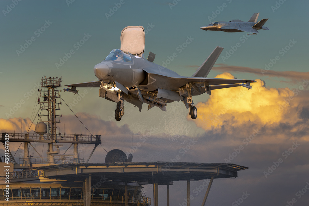 Foto de F-35 5th generation aircraft landing on an aircraft carrier do ...