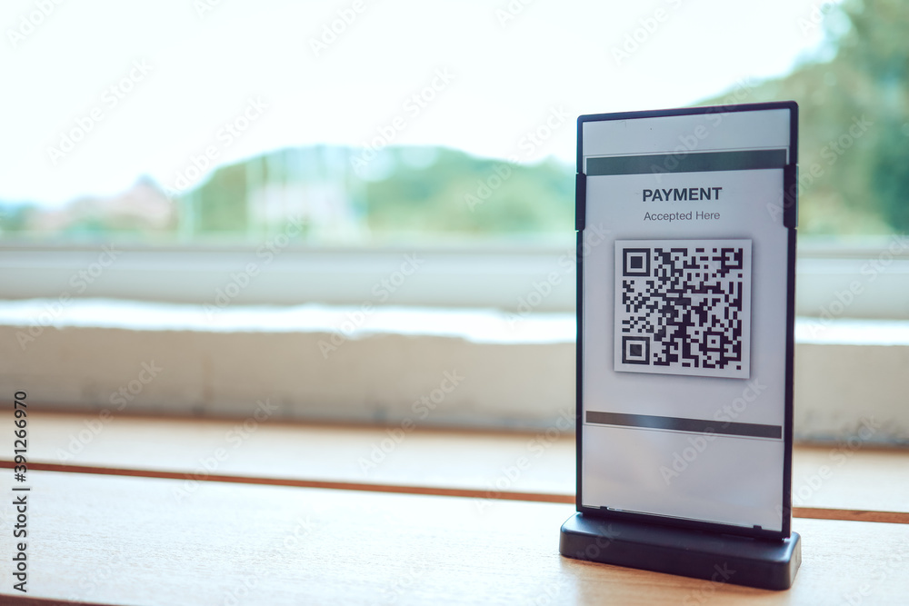E wallet Qr code payment. Woman scanning QR code online shopping ...