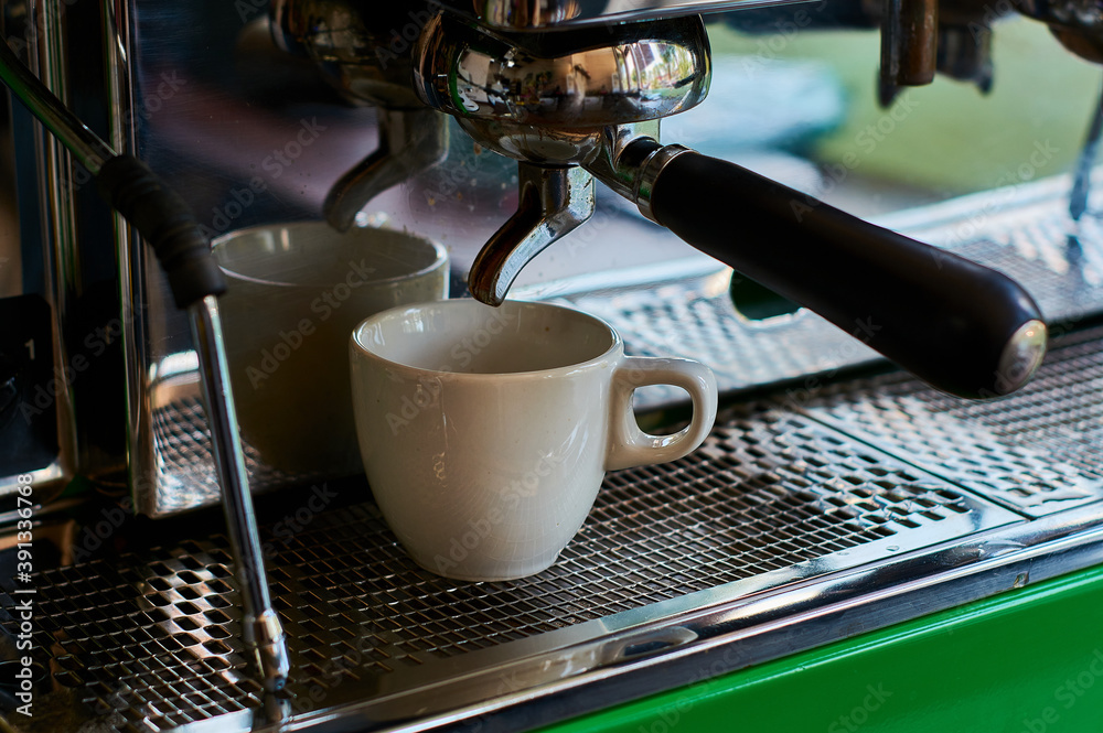 The process of making coffee in white ceramic cup on professional ...