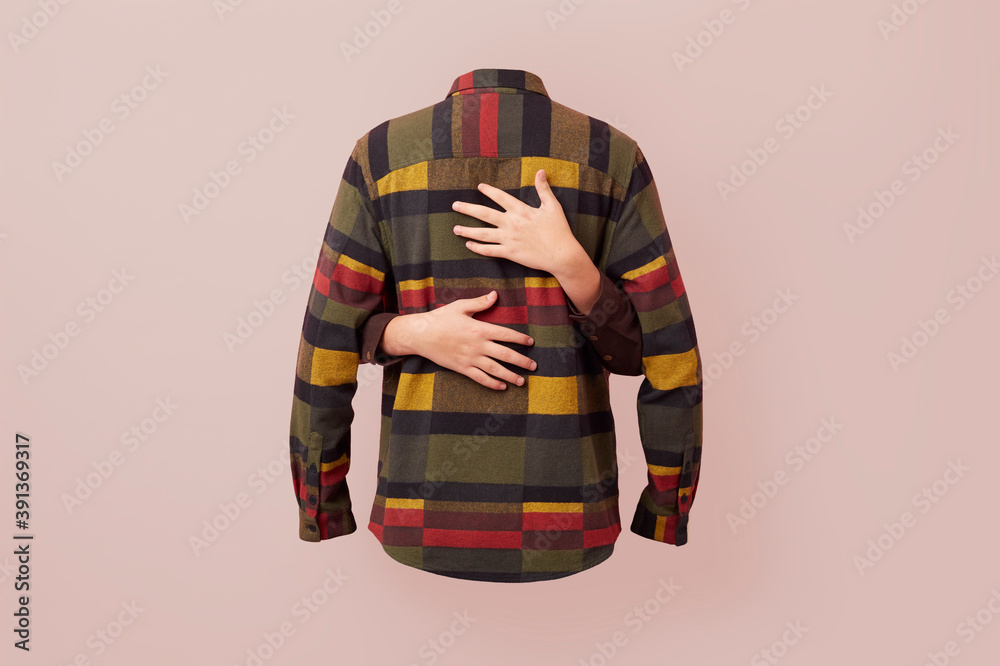 Caucasian hands hug a shirt Stock Photo | Adobe Stock