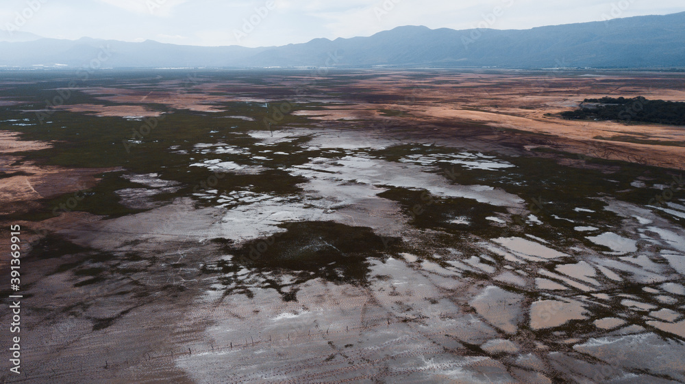 Drying lagoon - climate change leads to desertification of the ...