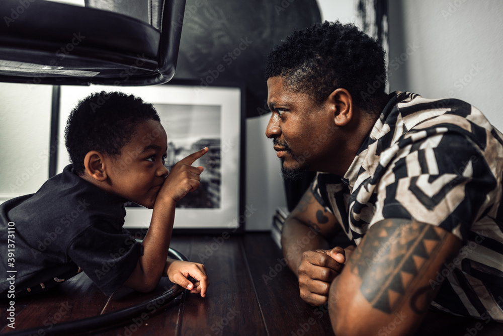Father and son indoor photoshoot Stock Photo | Adobe Stock