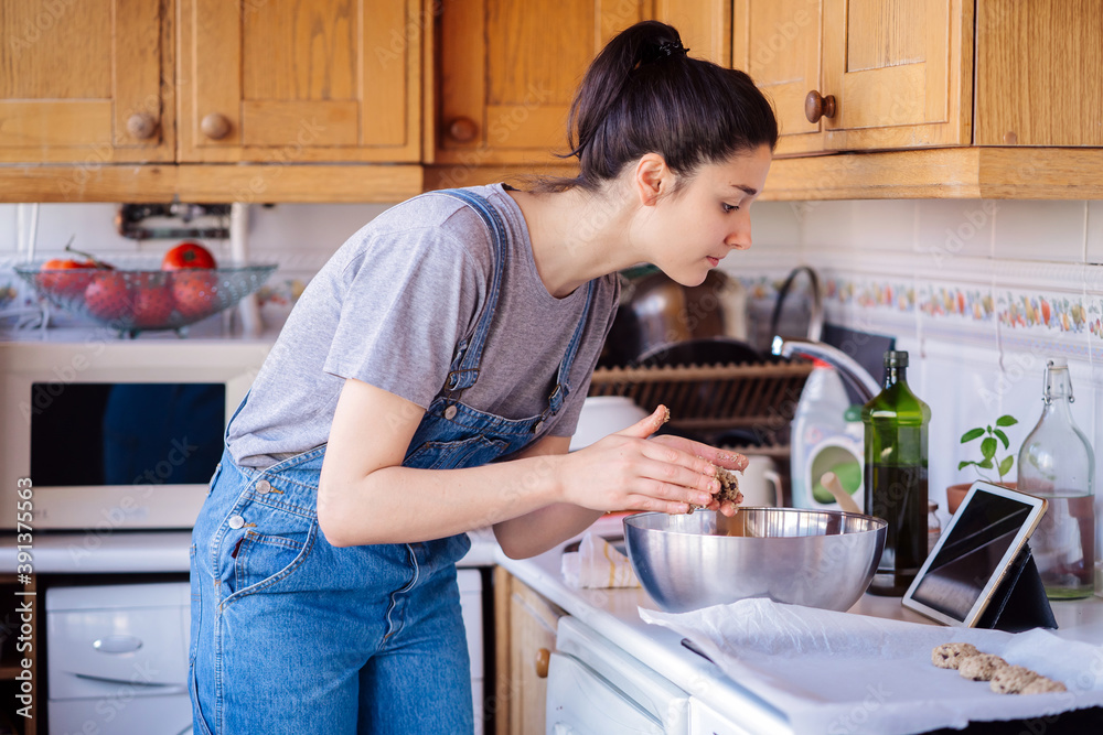 Woman Cooking At Home. Stock Photo | Adobe Stock