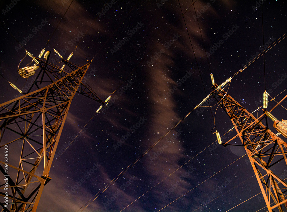 Starry night sky above the power transmission line Stock Photo | Adobe ...
