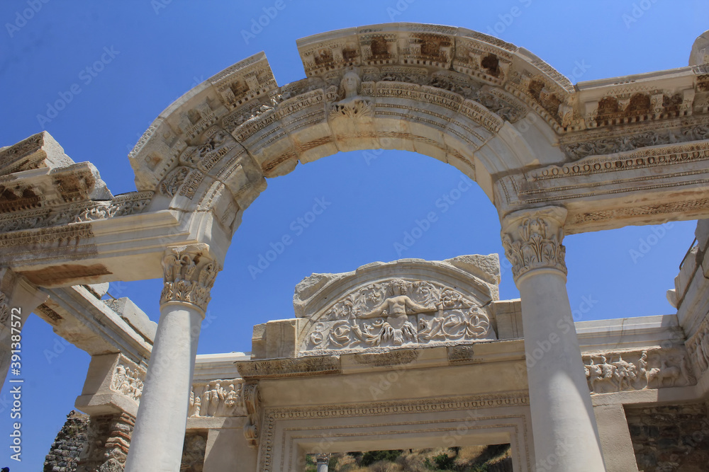 Ancient greek architectural arch and columns made of marble in ancient ...