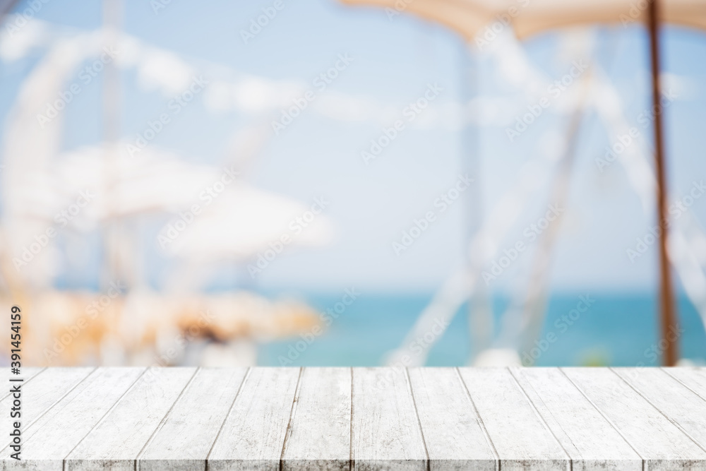 Empty wood table top and blurred summer beach in tropical resort banner ...
