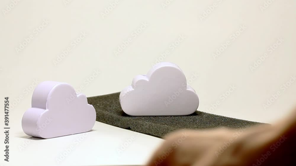 Wideo Stock: Building a cloud data storage solution model, hand putting ...