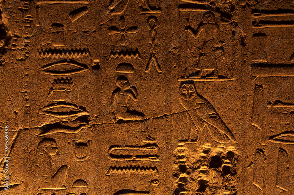 Ancient egyptian stone carvings on the walls of Luxor Temple in Egypt ...