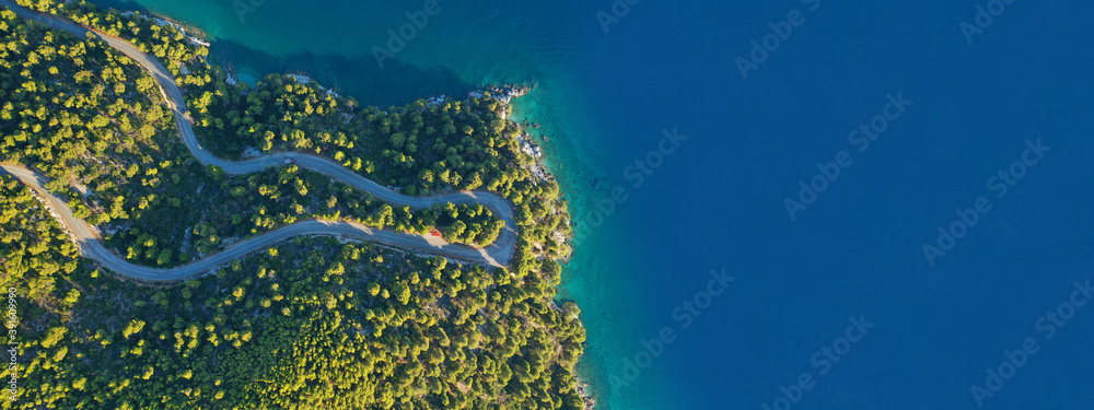 Aerial drone ultra wide top down panoramic photo of curvy snake road ...
