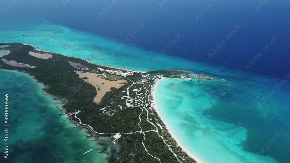 Blue water bay from the high above by drone. Bahamas Half moon Cay top ...