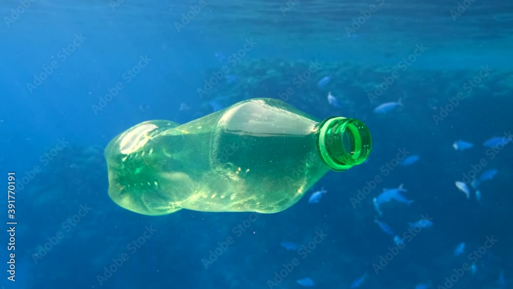 Vidéo Stock Plastic pollution, plastic bottle in blue water. Discarded ...