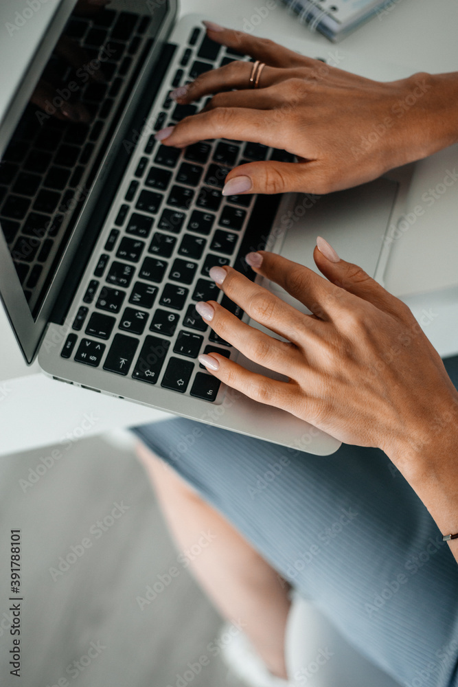 Cozy workplace in home office with laptop on a table for online ...