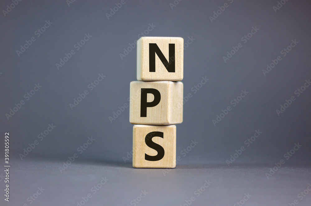 Wood cubes with acronym 'NPS' - 'net promoter score' on a beautiful ...