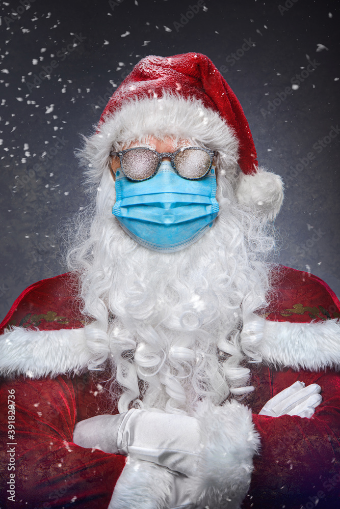 Waist up portrait of cool rock Santa in Doctor mask against coronavirus ...