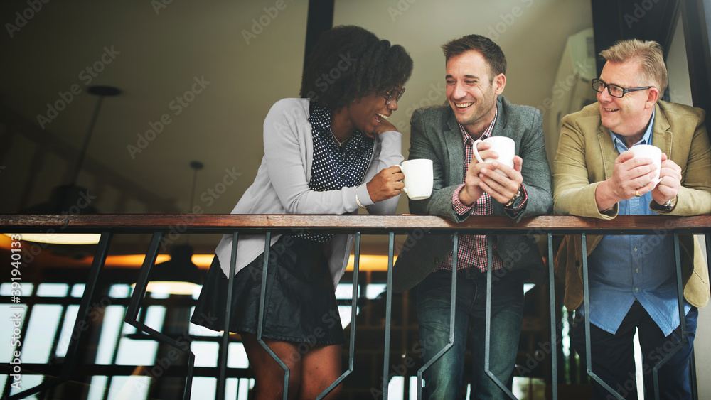 Diverse business people having a coffee break Stock Photo | Adobe Stock