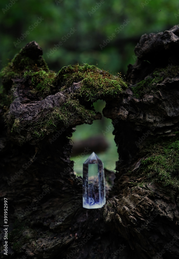 quartz crystal mineral on nature forest background. Magic Rock for ...