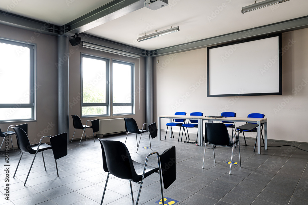 Simple conference room no people speaker's table and chairs with big ...