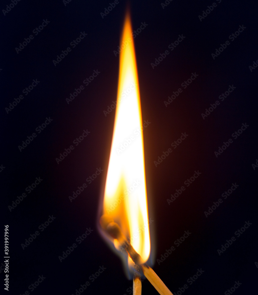 two matchstick lit on black background Stock Photo | Adobe Stock