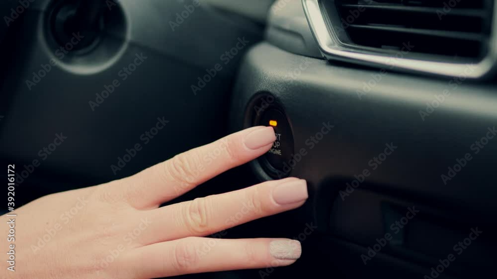 Driver Hand Pushing Start Engine Button Motor In Car.Starting Car ...