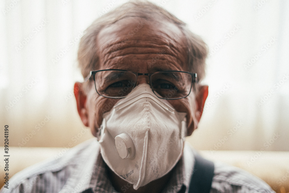 Old man with safety implements Stock Photo | Adobe Stock