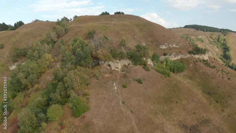 Rocky slope on mountain from drone above. Hills and highlands in ...