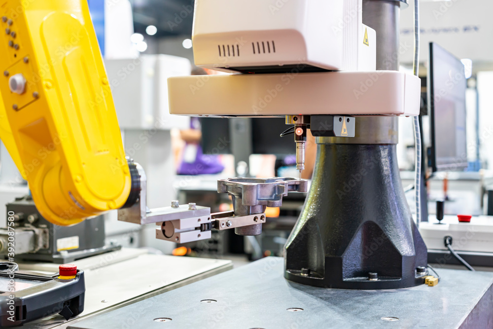 automatic coordinate measurement machine (CMM) during inspection ...